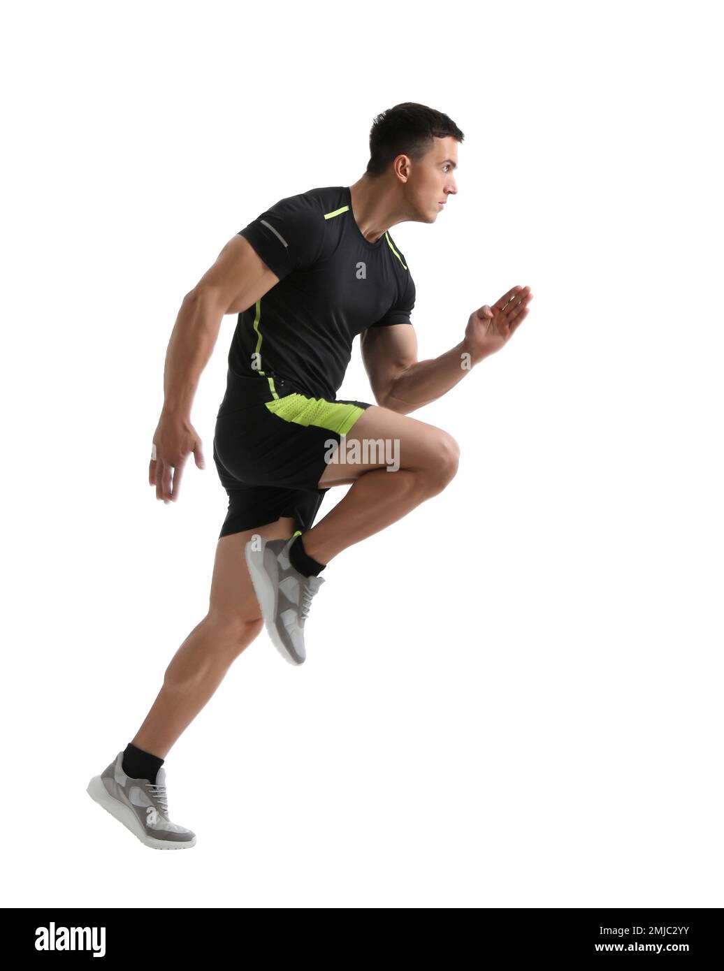 Athletic young man running on white background, side view Stock Photo ...
