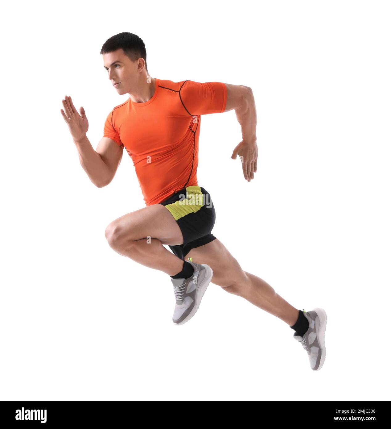 Athletic young man running on white background, side view Stock Photo ...