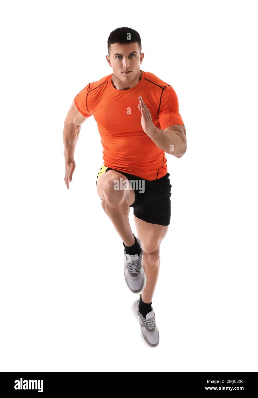 Athletic young man running on white background Stock Photo - Alamy