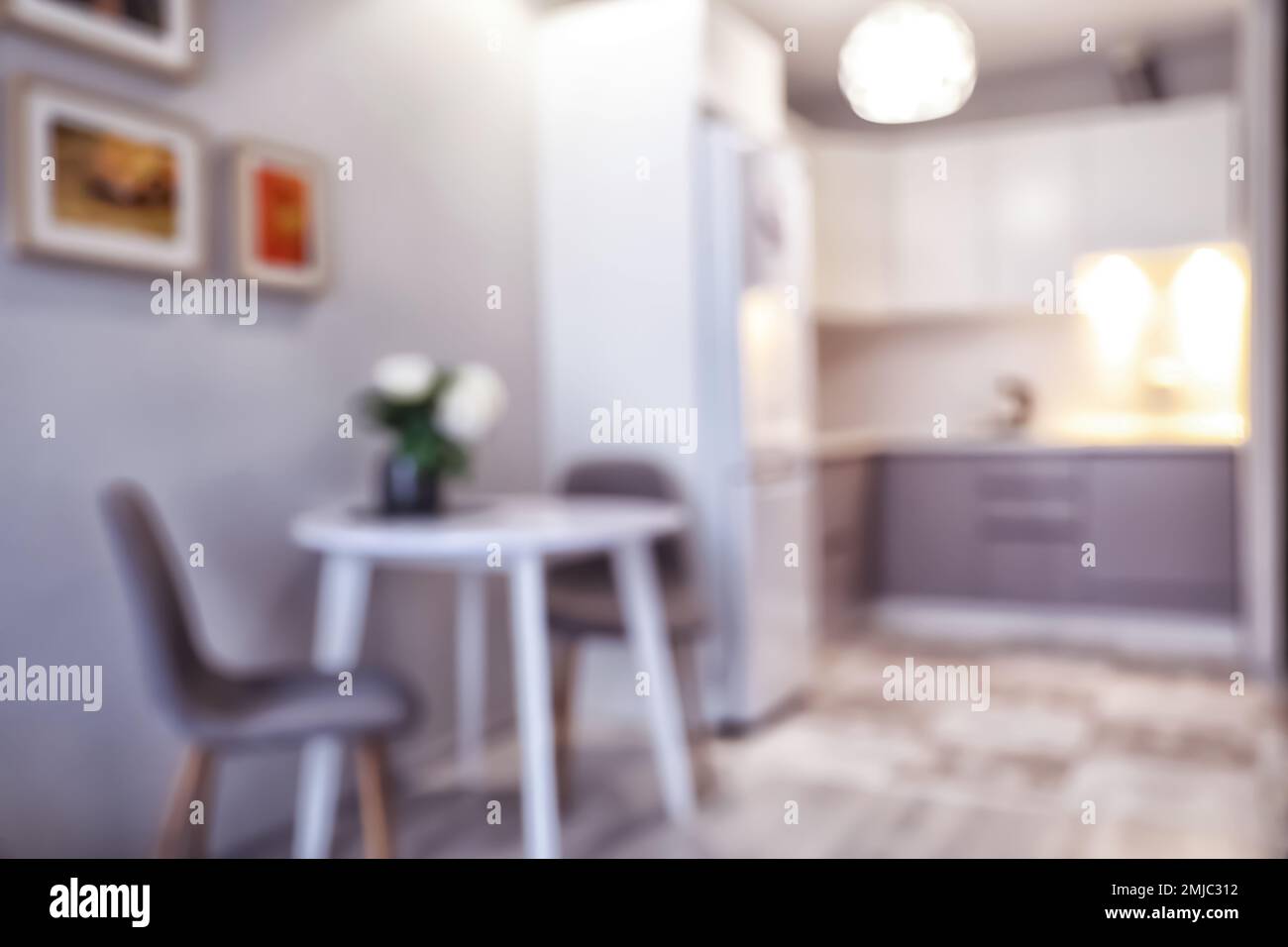 Blurred view of stylish modern kitchen interior Stock Photo - Alamy