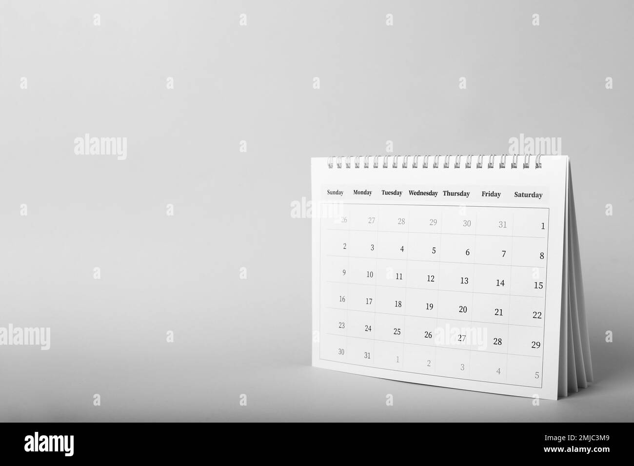 Paper calendar on grey background, space for text. Planning concept ...