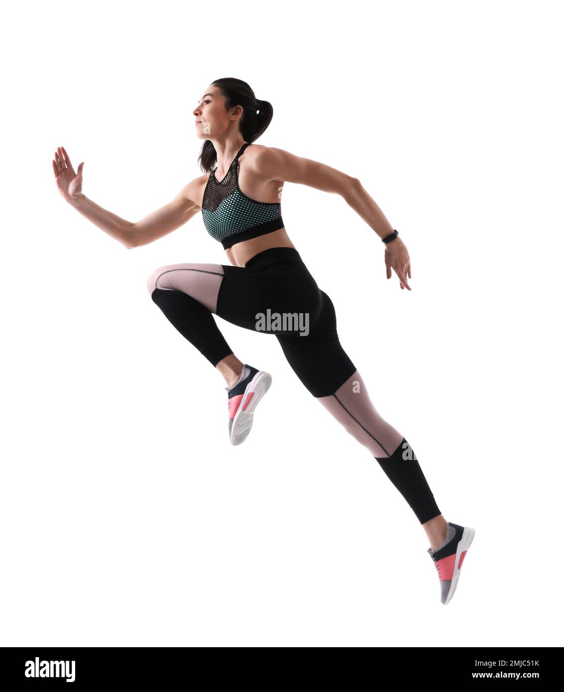 Athletic young woman running on white background, side view Stock Photo ...