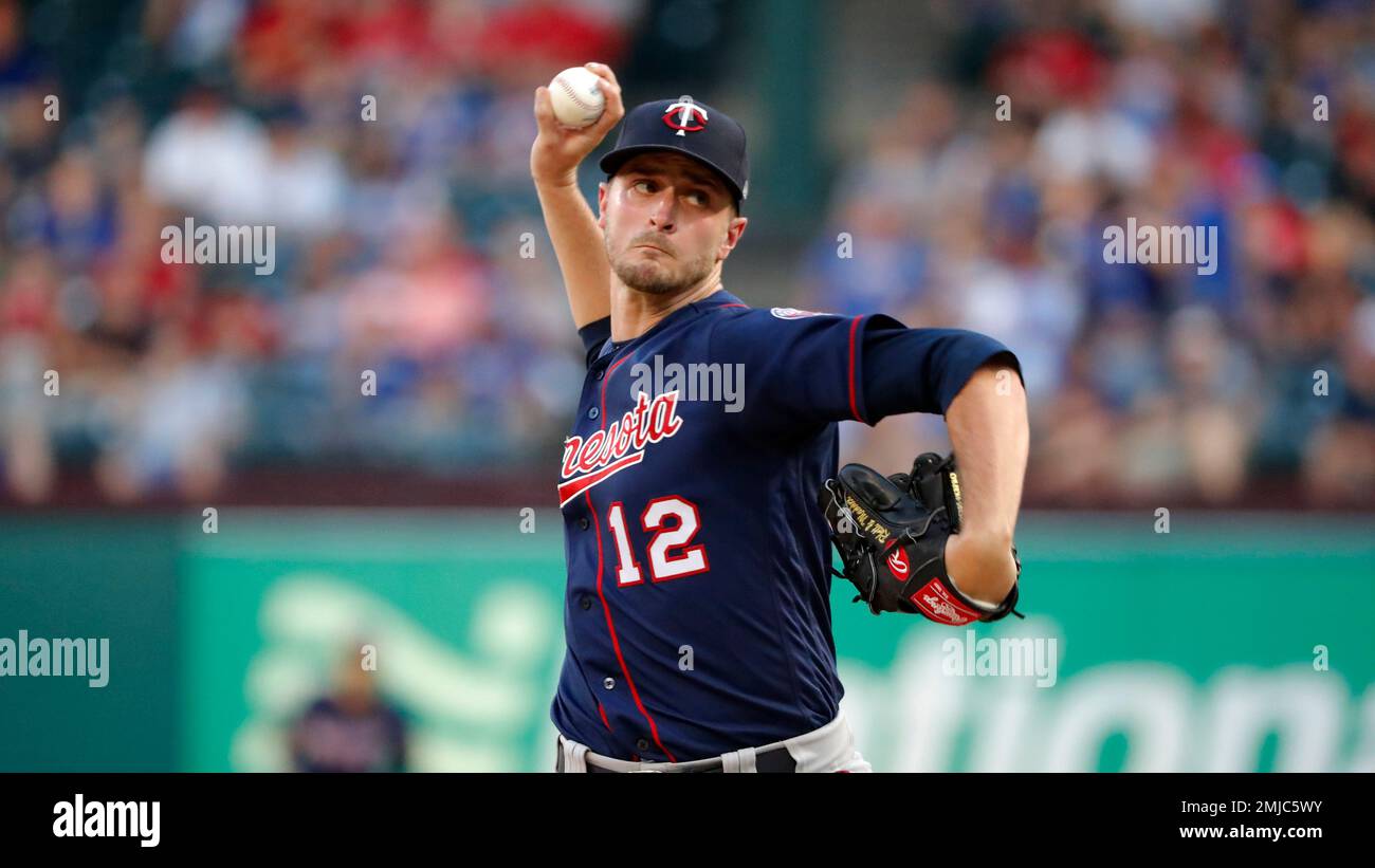 Minnesota Twins starting pitcher Jake Odorizzi (12) throws to the Texas ...
