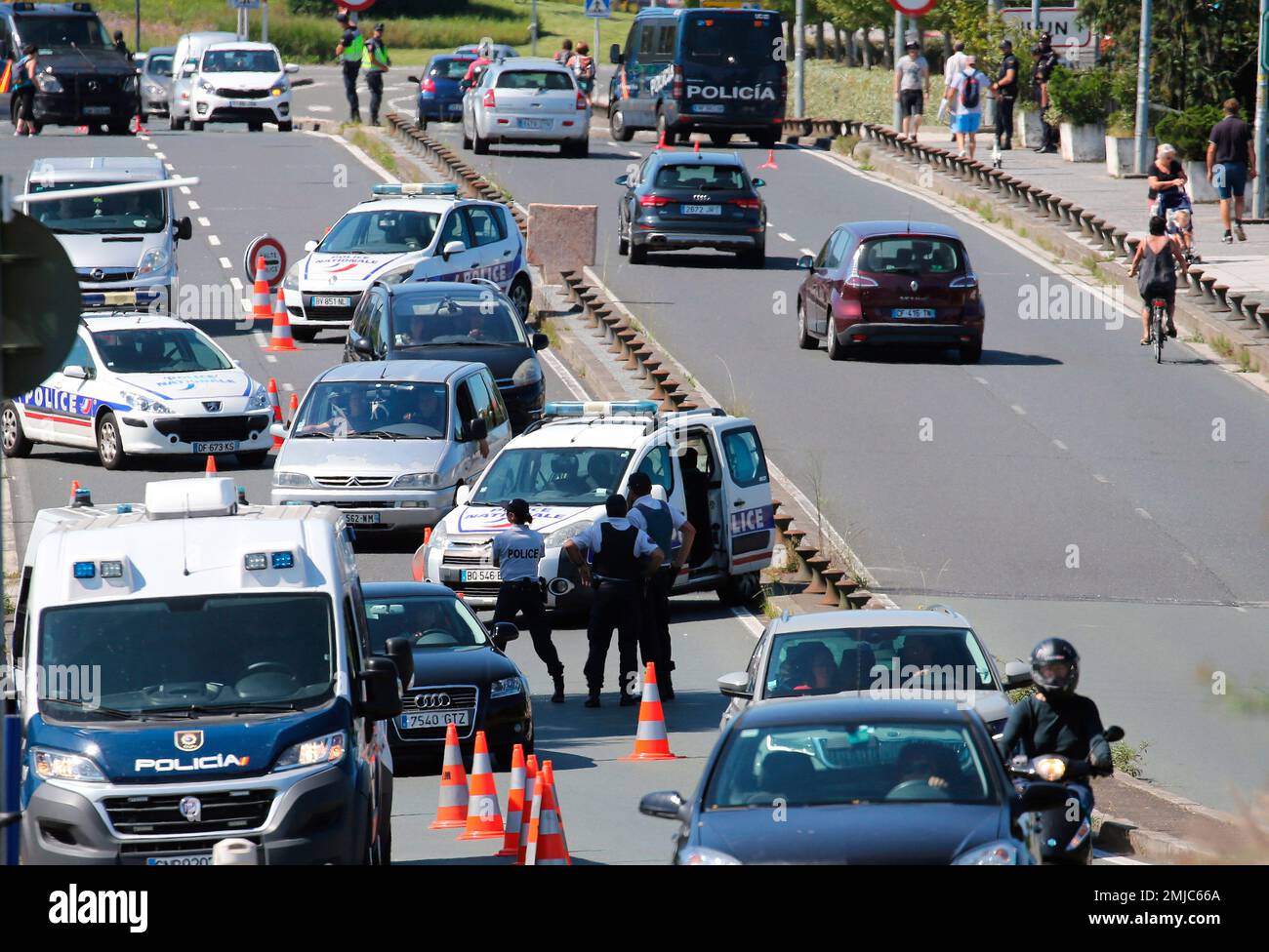 French police officers patrol over the border between Spanish and ...