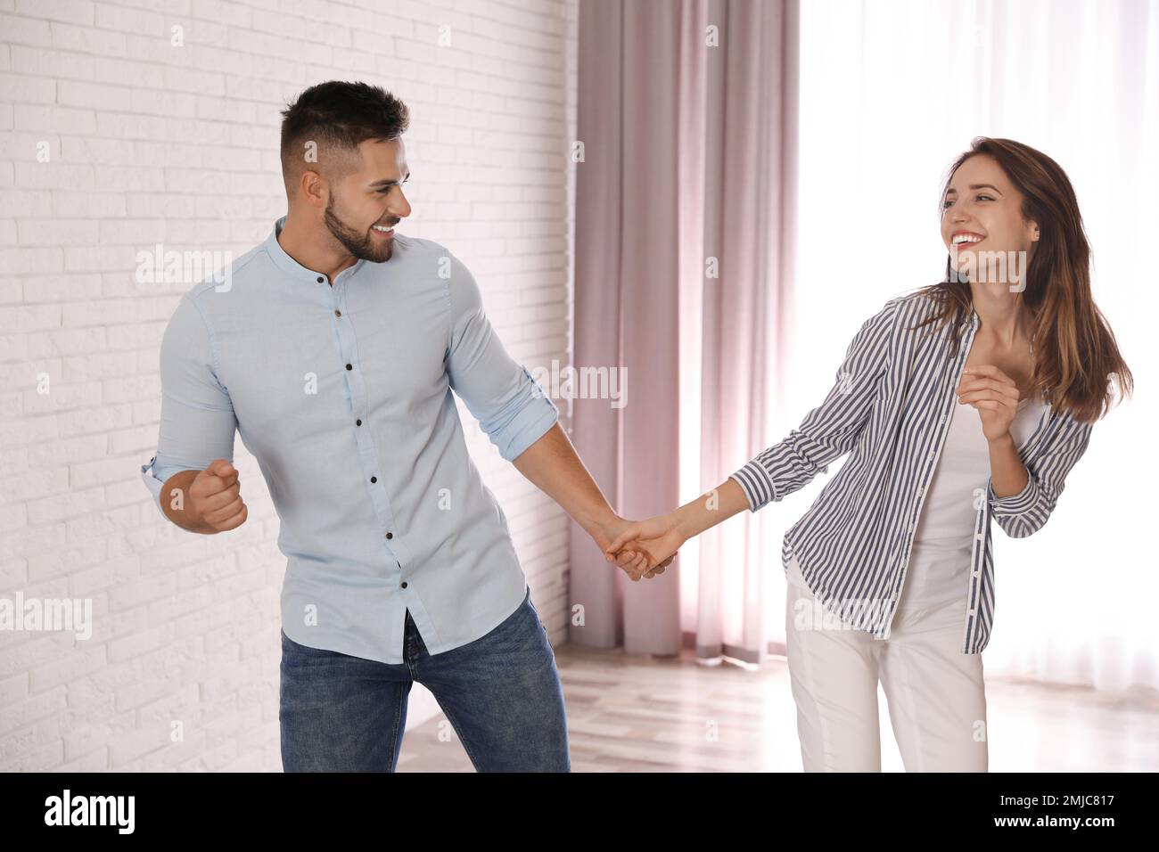 Passionate couple dancing date home hi-res stock photography and images ...