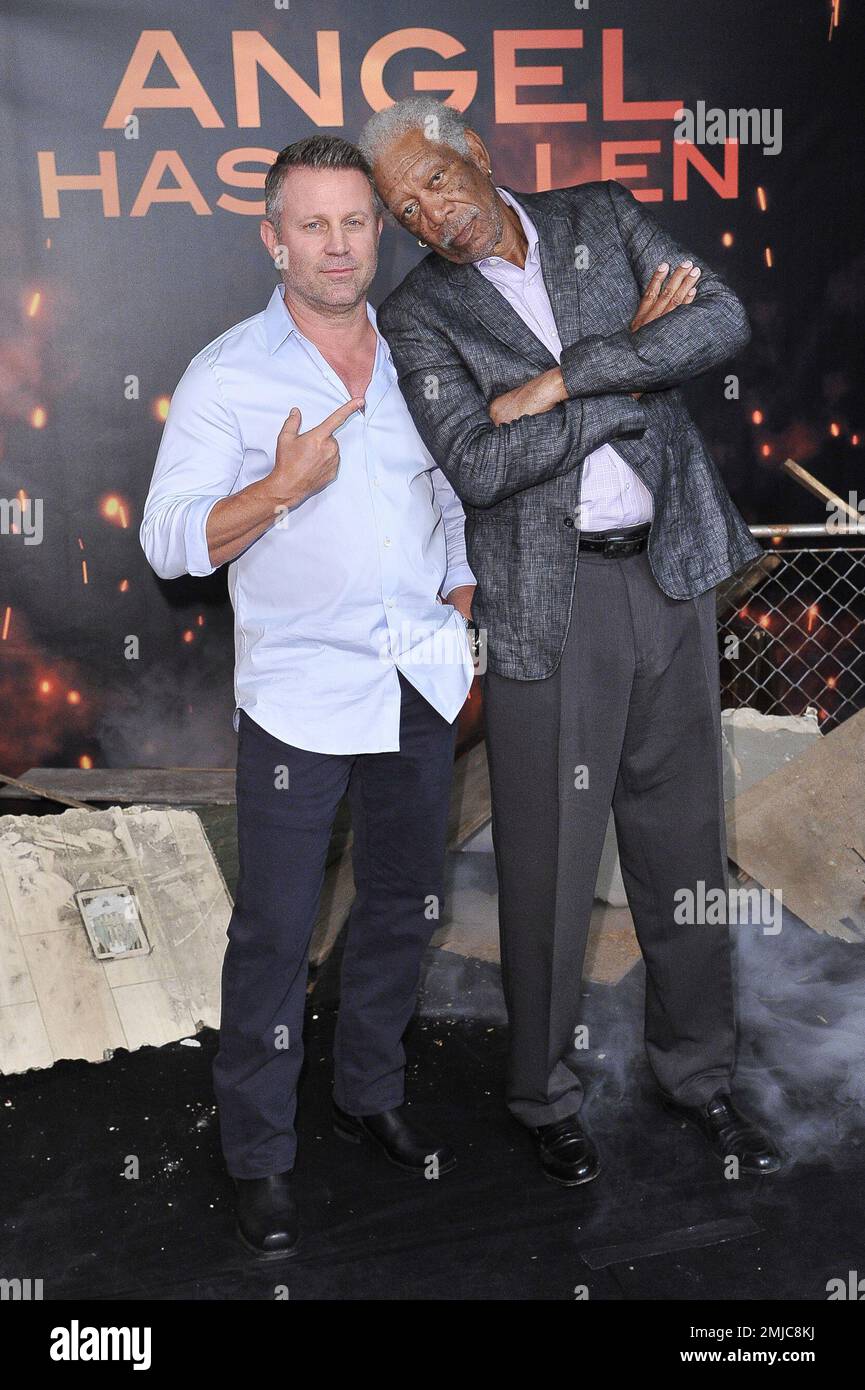 Ric Roman Waugh, left, and Morgan Freeman attend a photo call for ...