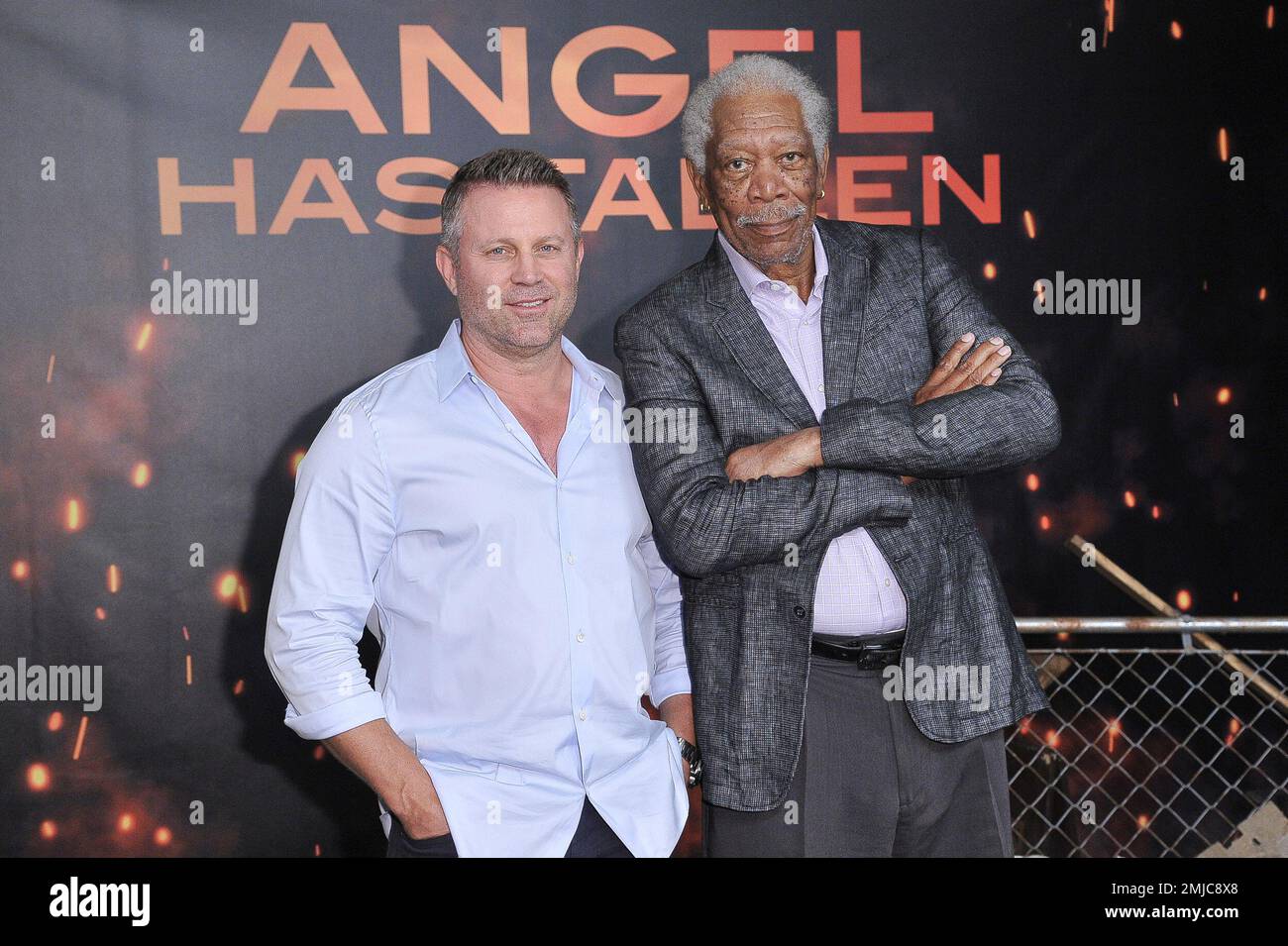 Ric Roman Waugh, left, and Morgan Freeman attend a photo call for ...