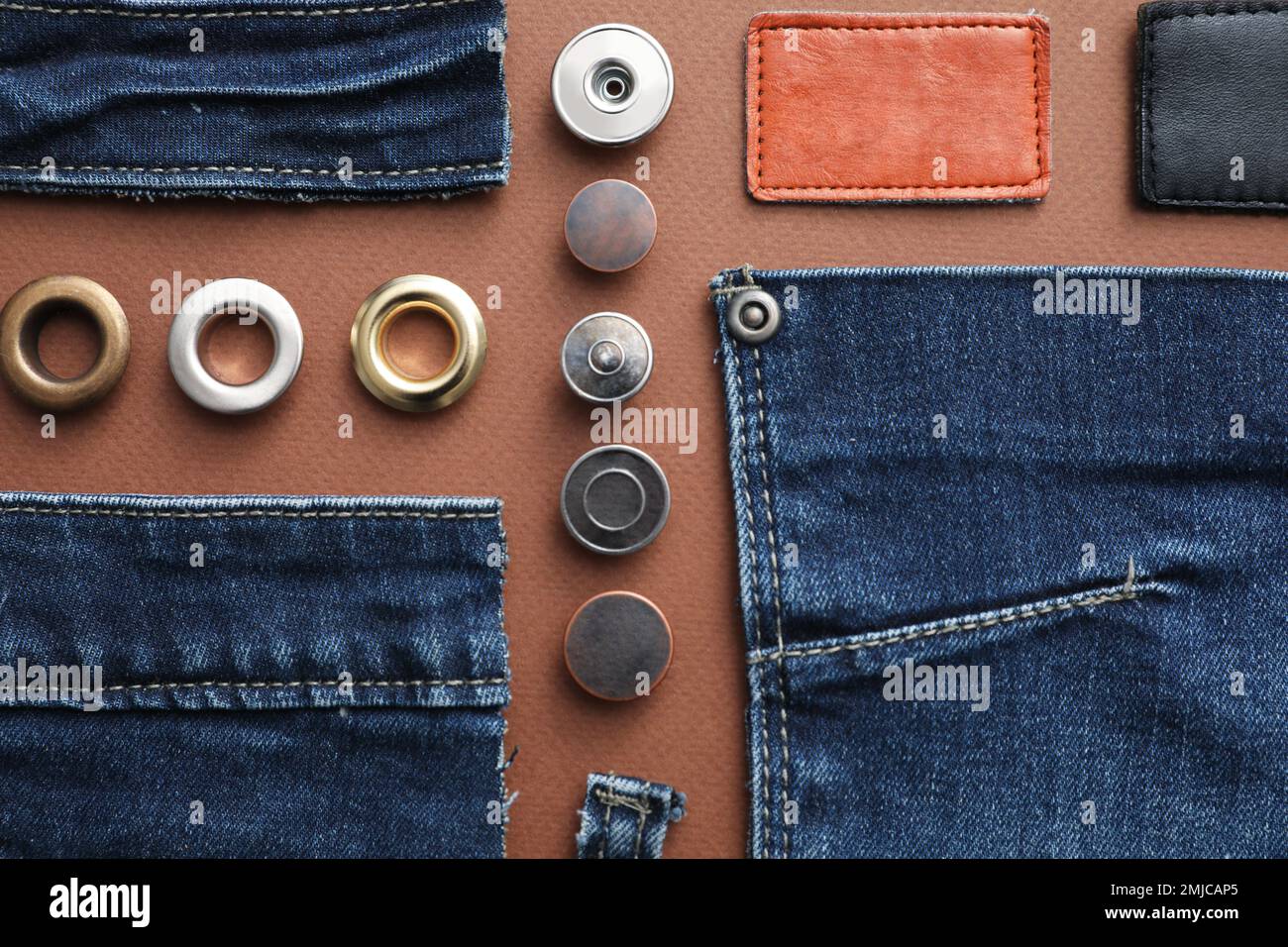 Flat lay composition with garment accessories and cutting details for ...