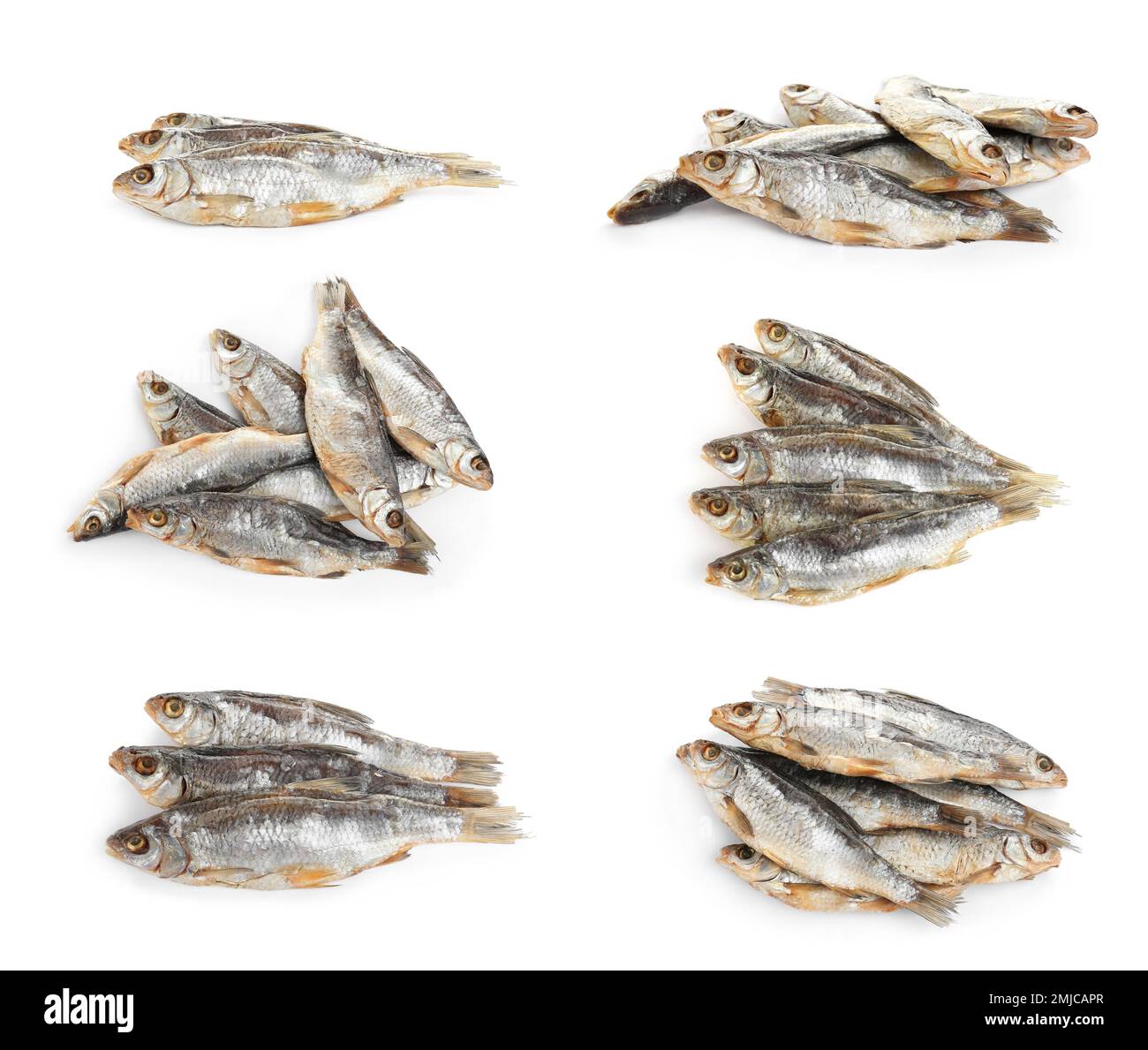Set of tasty dry fish on white background Stock Photo - Alamy