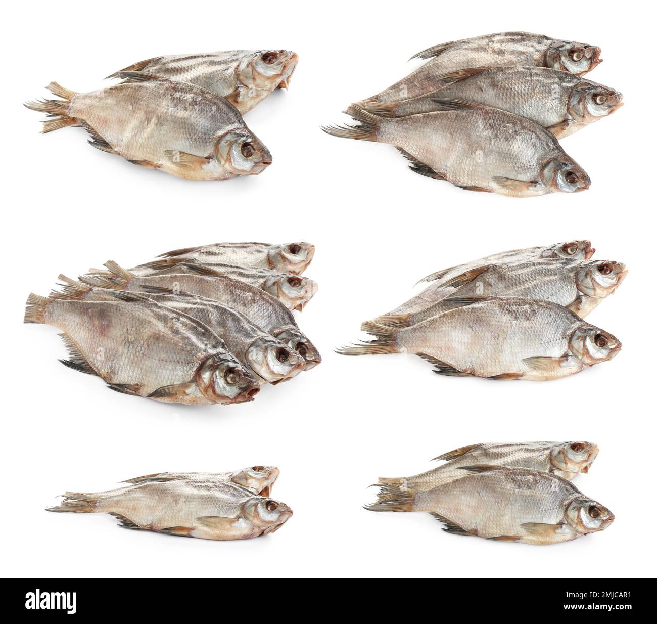 Set of tasty dry fish on white background Stock Photo - Alamy