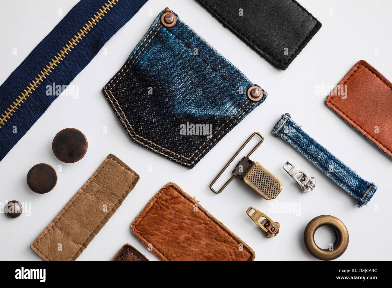 Composition with garment accessories and cutting details for jeans ...