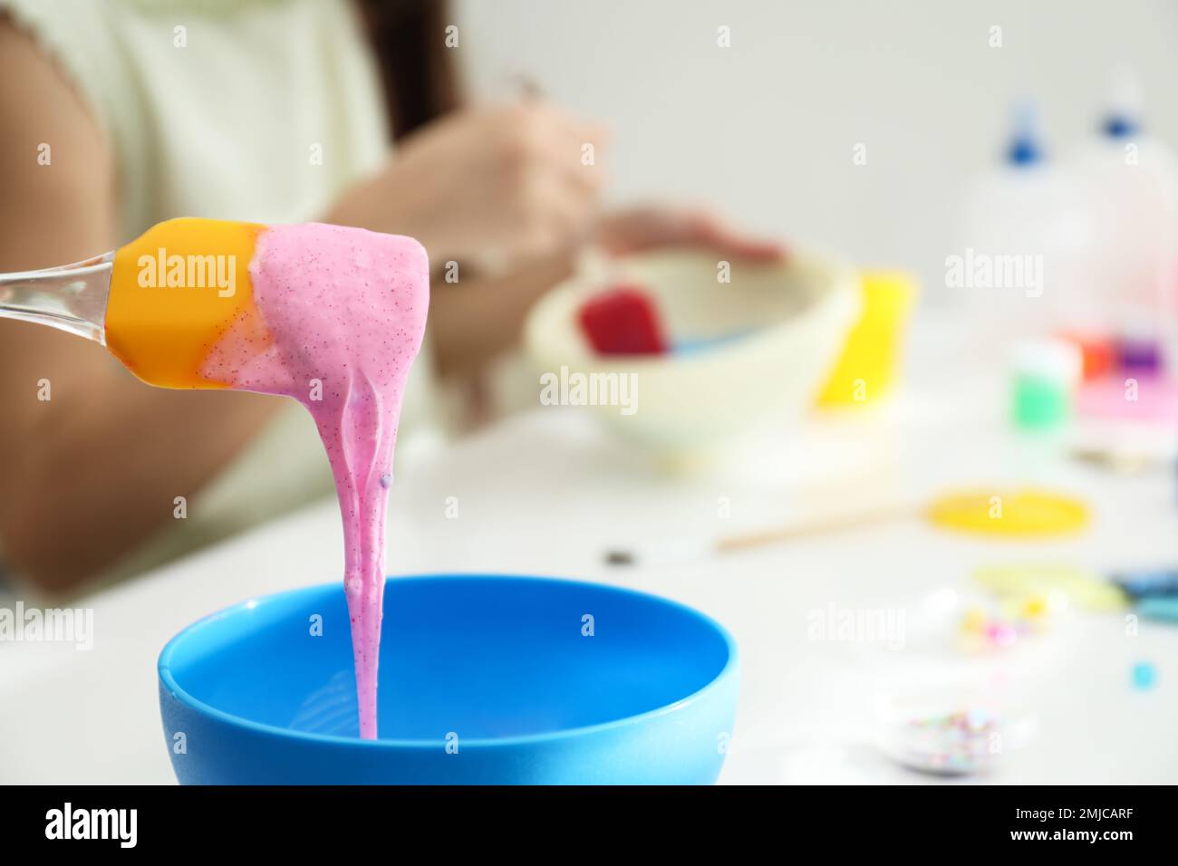 Slime pouring hi-res stock photography and images - Alamy