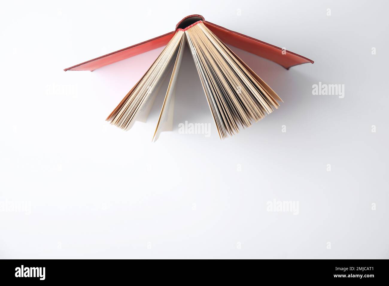 Open book on white background, top view Stock Photo - Alamy