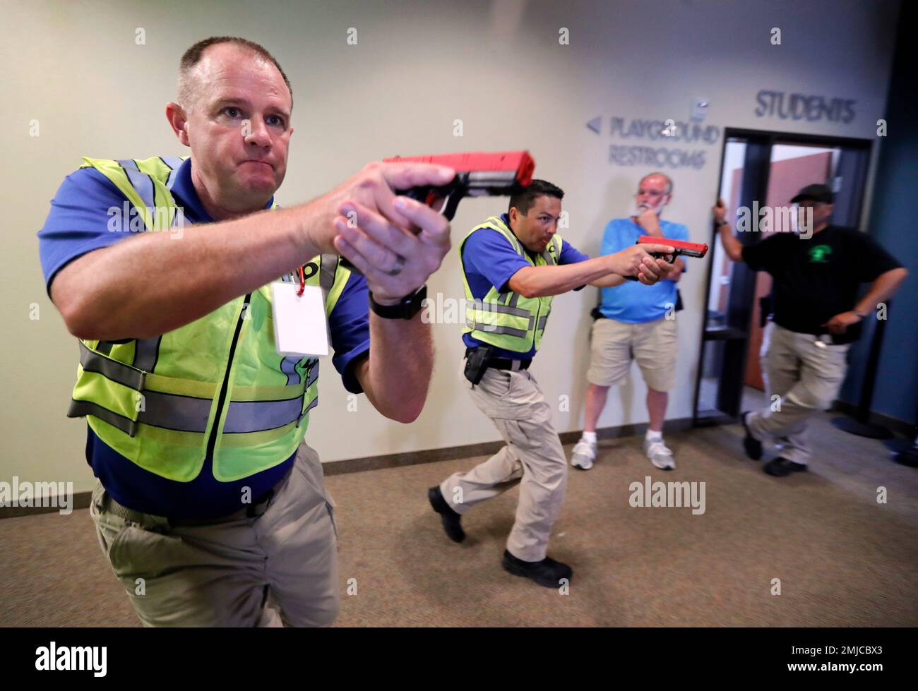 In this July 21, 2019 photo, Police officers David Riggall, left, and ...