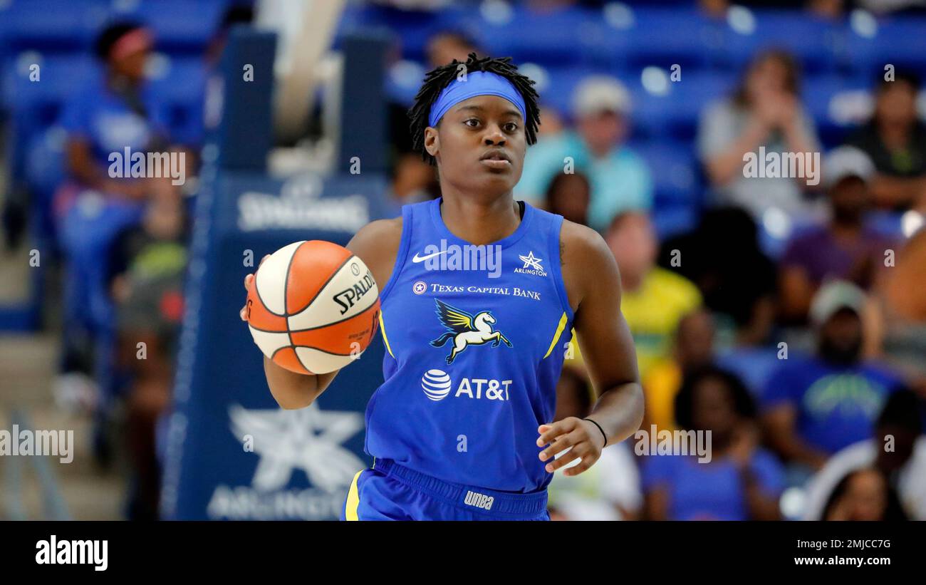 Dallas Wings' Kaela Davis handles the ball during a WNBA basketball ...