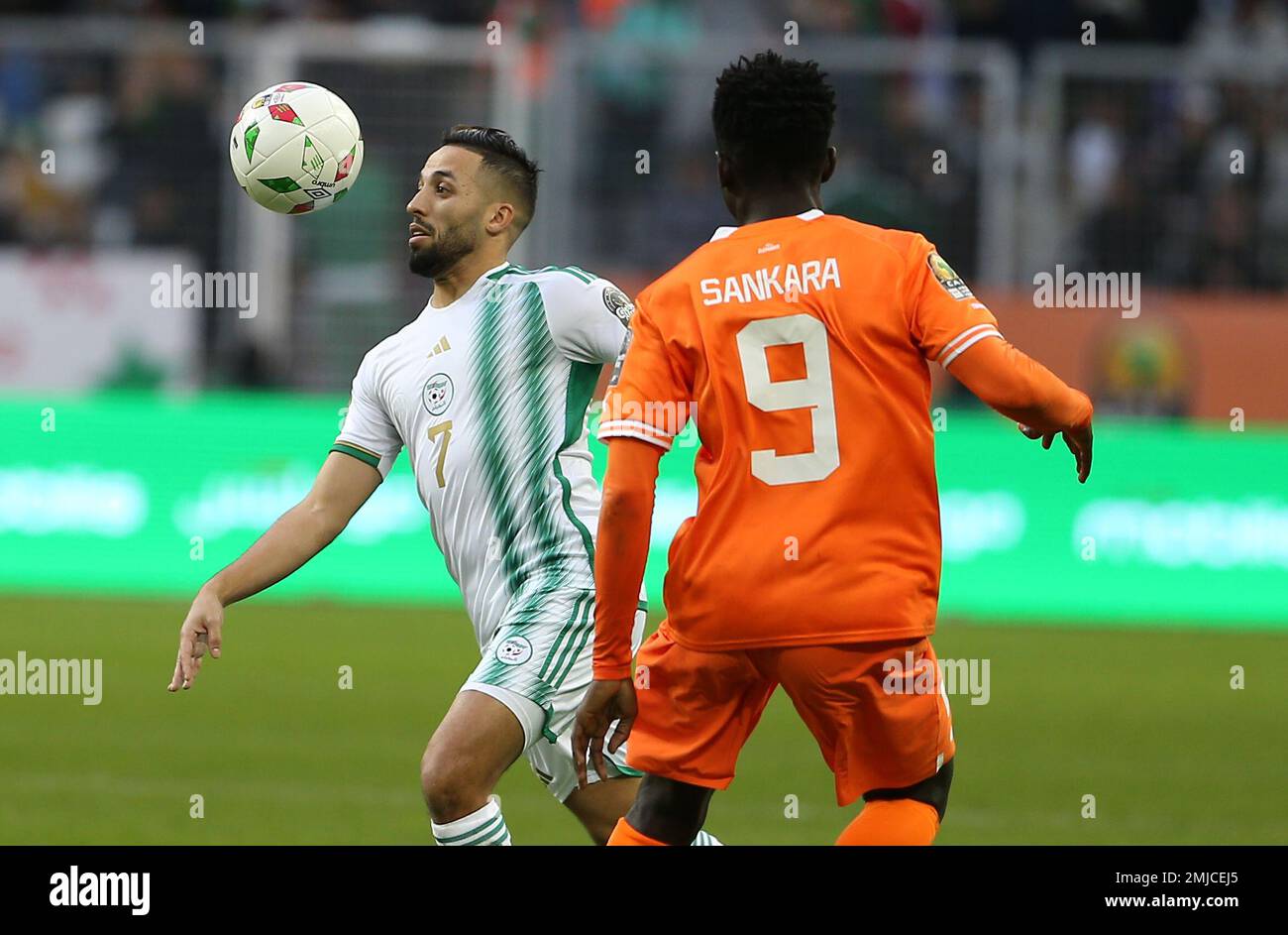 Algiers. 28th Jan, 2023. Algeria's Abderrahmane Meziane (L) vies with ...