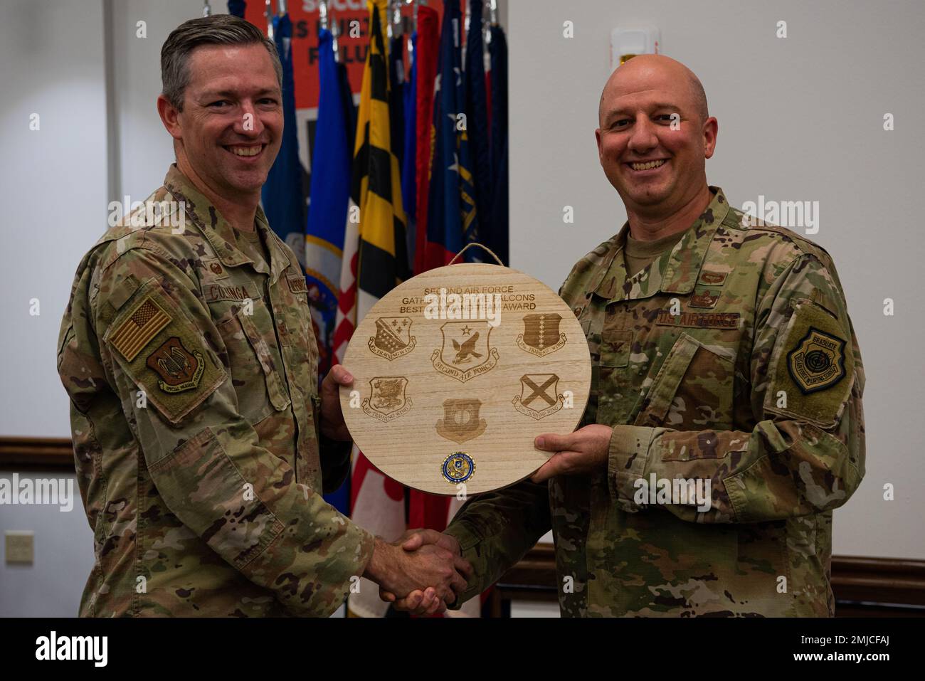 U.S. Air Force Col. Nathan Colunga, Special Warfare Training Wing commander, presents the best ...