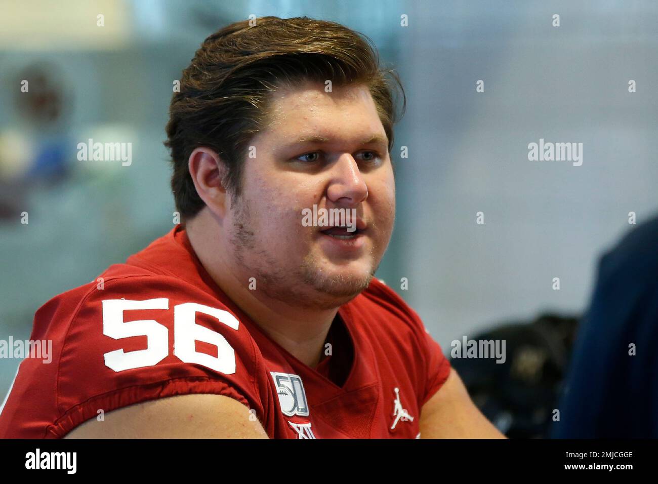Oklahoma offensive lineman Creed Humphrey answers a question during an ...