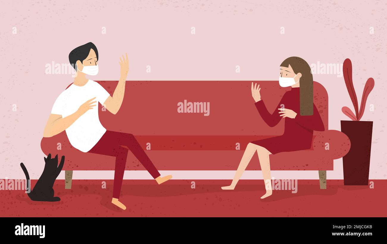 Couple wearing masks and keeping a physical distance in their own home ...