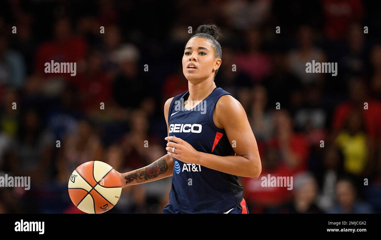 Washington Mystics guard Natasha Cloud dribbles the ball during the ...