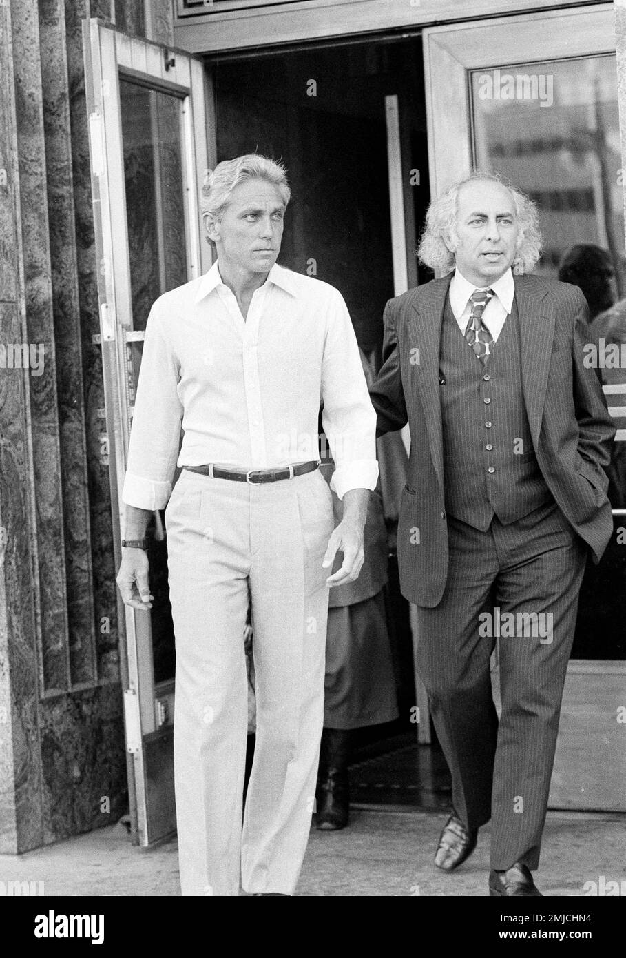 Dr. Jeffrey MacDonald, left, and his attorney Bernard Segal walk ...