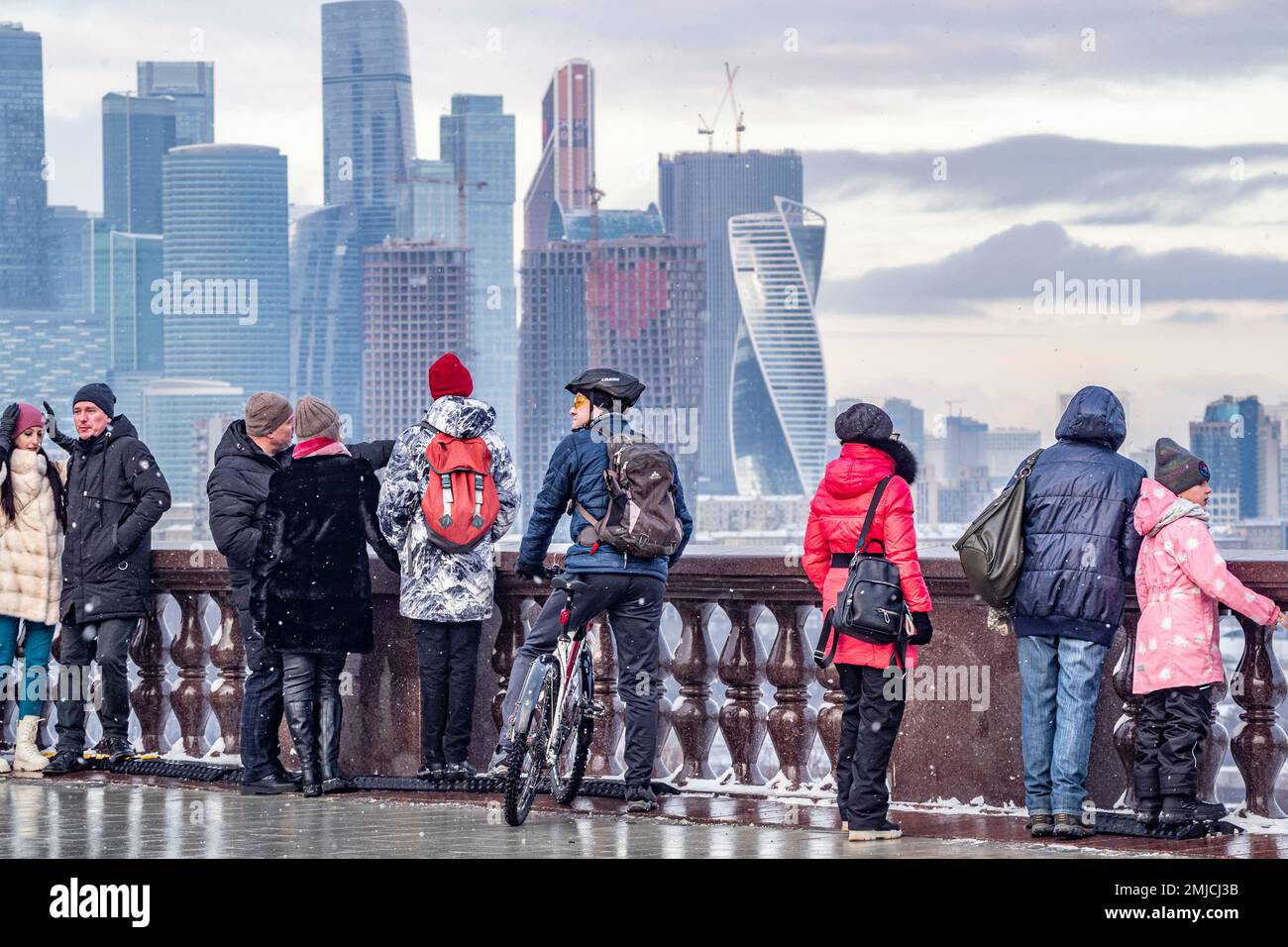 Russia, Moscow. People are seen on an observation deck on Vorobyovy ...