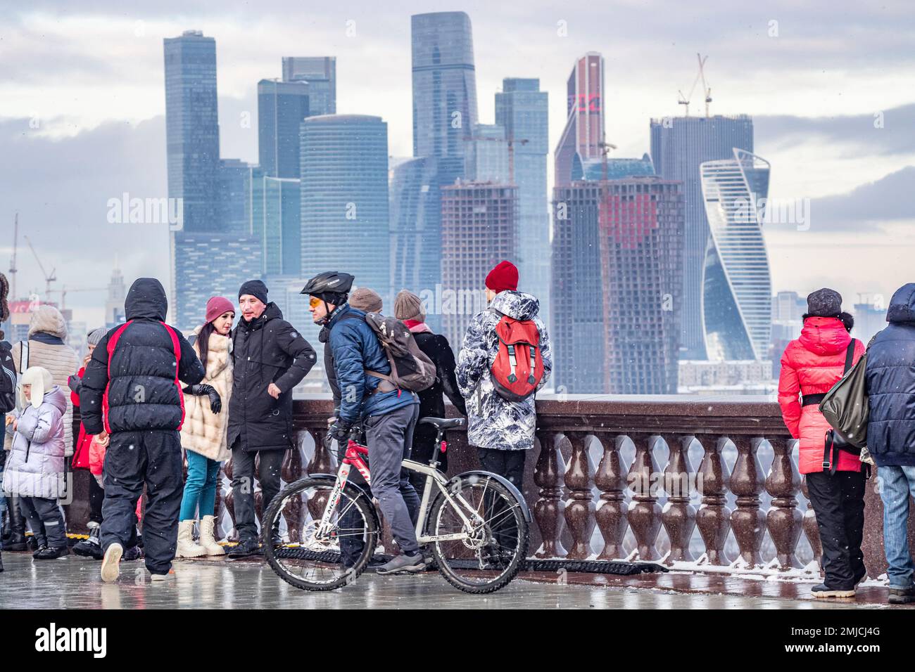 Russia, Moscow. People are seen on an observation deck on Vorobyovy ...