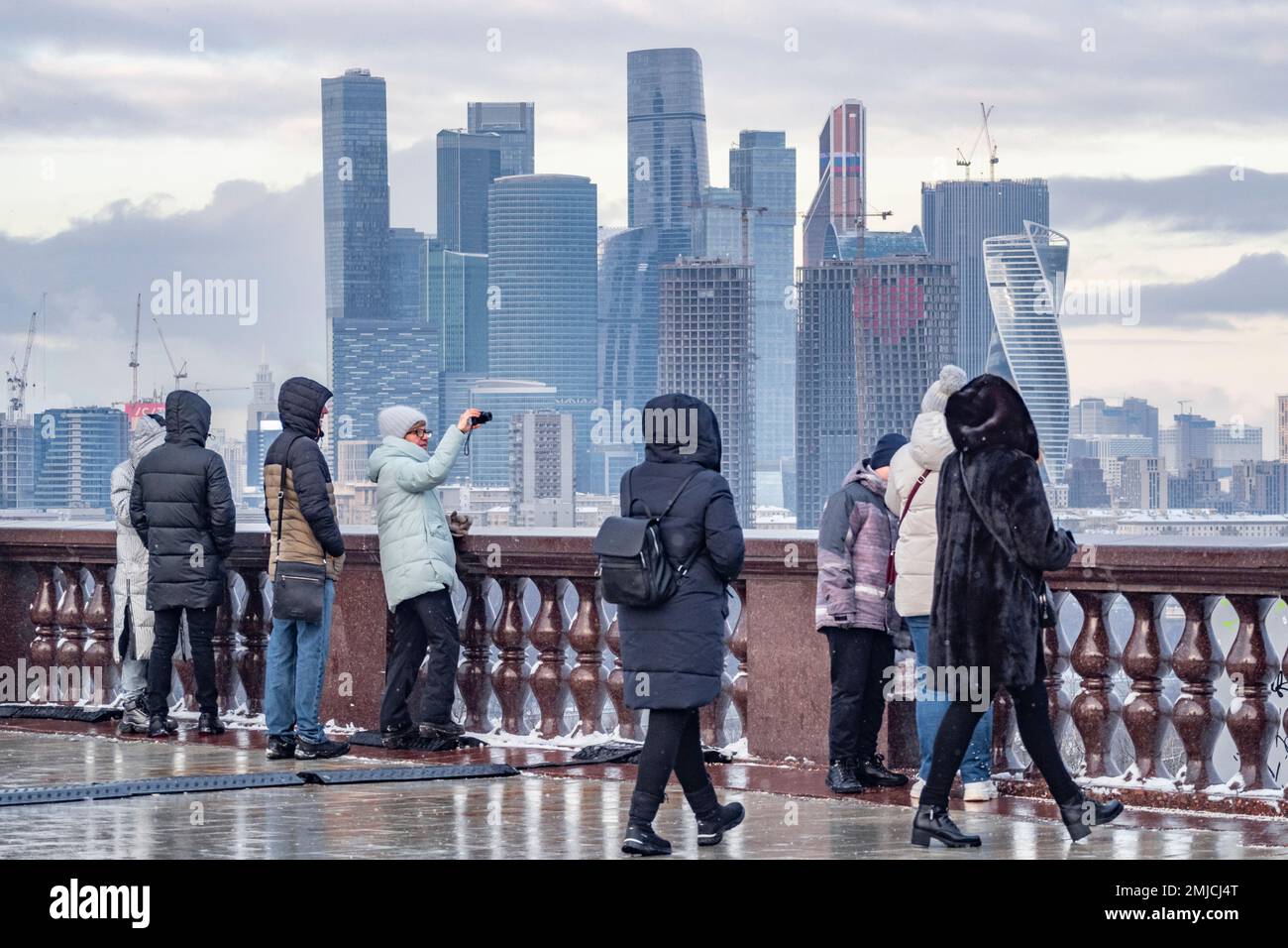Russia, Moscow. People are seen on an observation deck on Vorobyovy ...