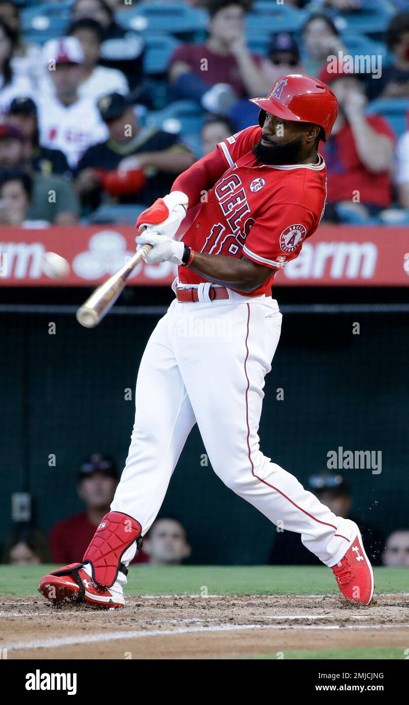 Los Angeles Angels' Brian Goodwin hits against the Pittsburgh Pirates ...