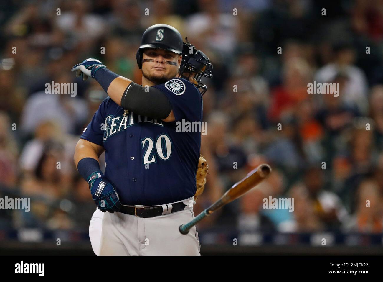 Seattle Mariners' Daniel Vogelbach throws his bat after striking out ...