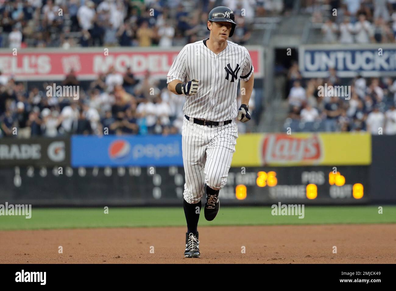 New York Yankees' DJ LeMahieu runs the bases after hitting a home run ...