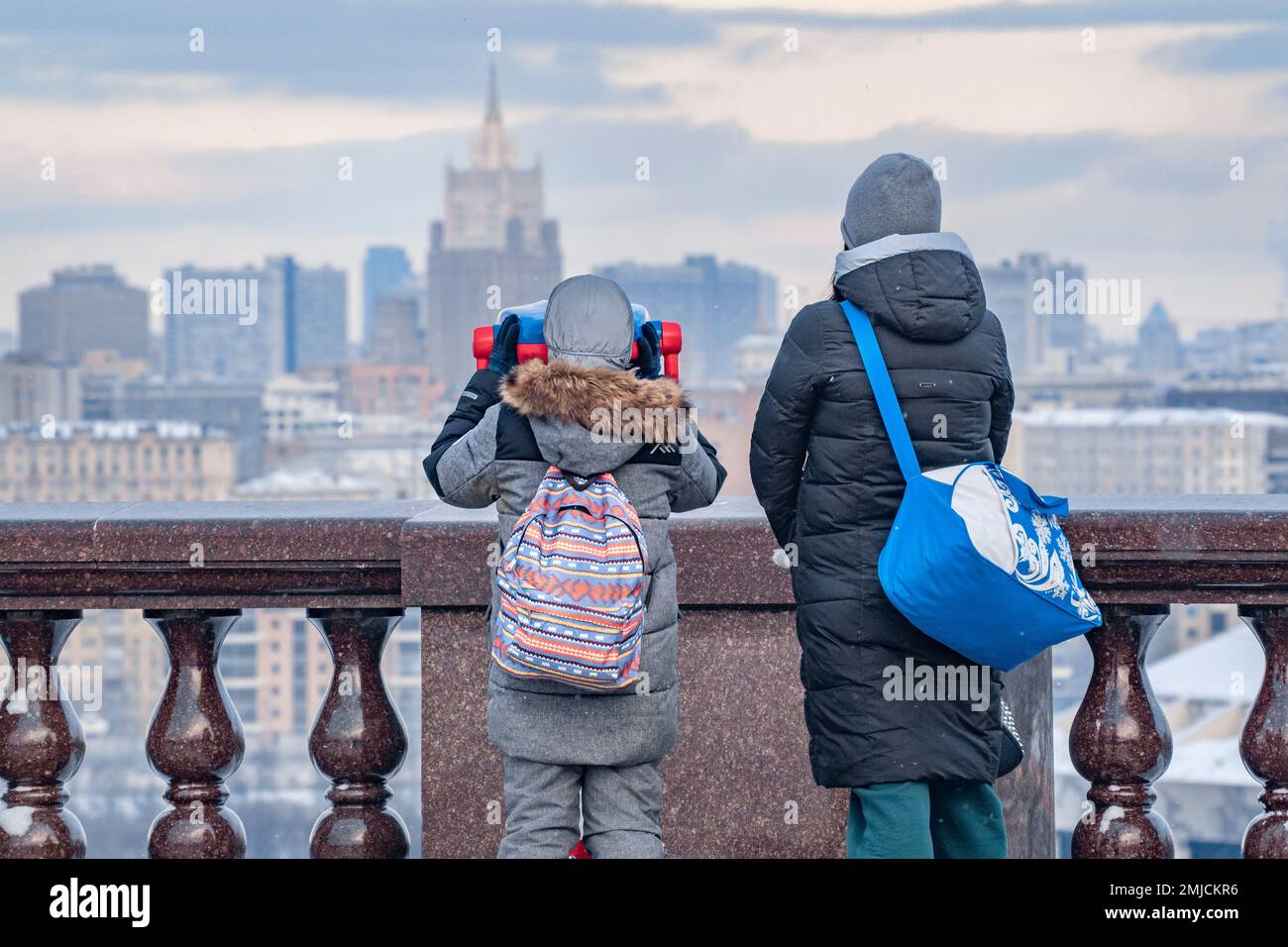Russia, Moscow. People are seen on an observation deck on Vorobyovy ...