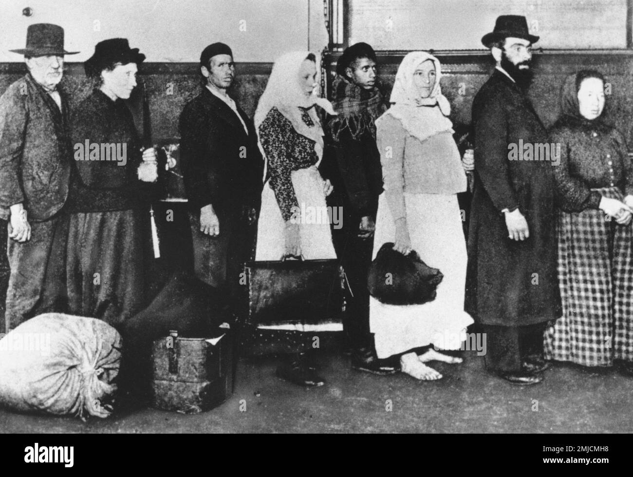 FILE - In this undated file photo, a group of immigrants who arrived at ...