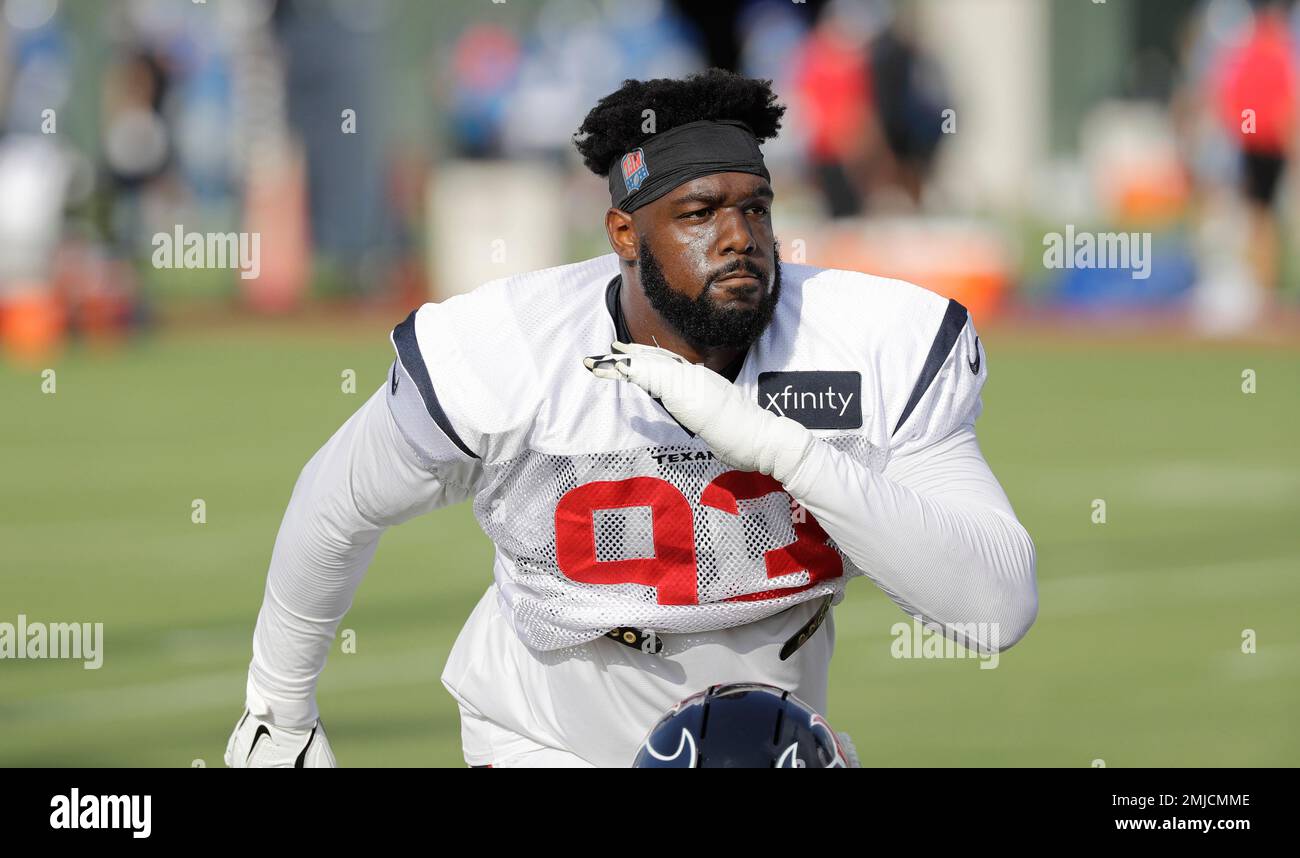 Houston Texans defensive end Joel Heath (93) practices a move during a joint NFL training camp ...