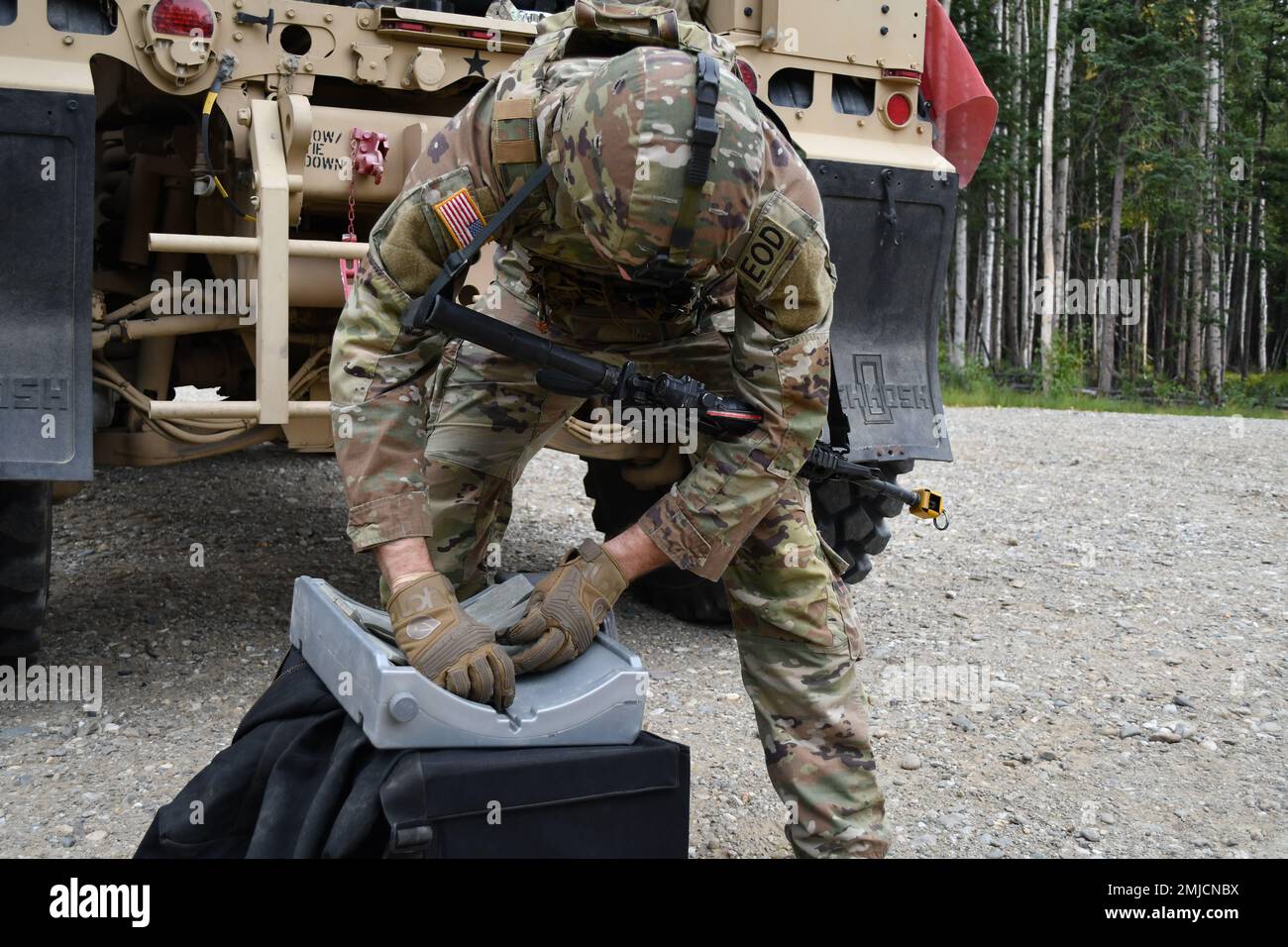 SPC Jason Blauser, 65th Explosive Ordnance Disposal Company, assembles ...