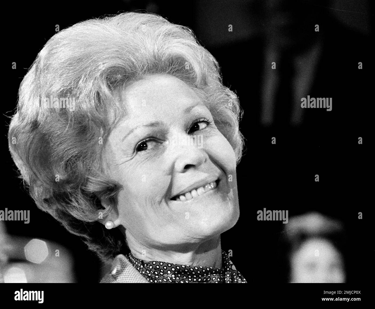 First lady Pat Nixon is pictured smiling on the White House lawn before ...