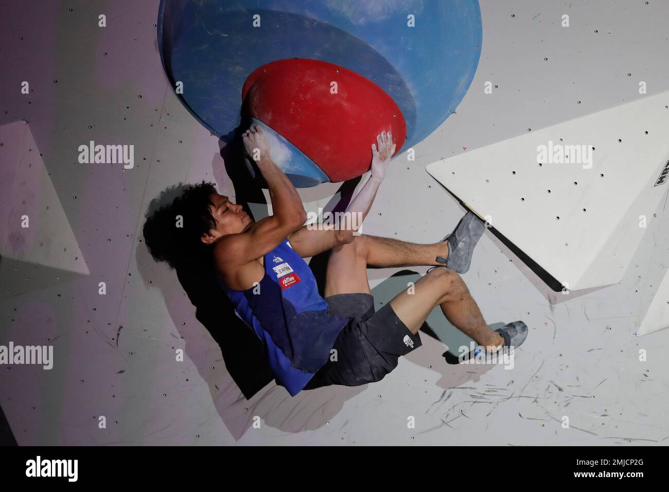 Tomoa Narasaki, of Japan, competes in the men's bouldering final at the ...