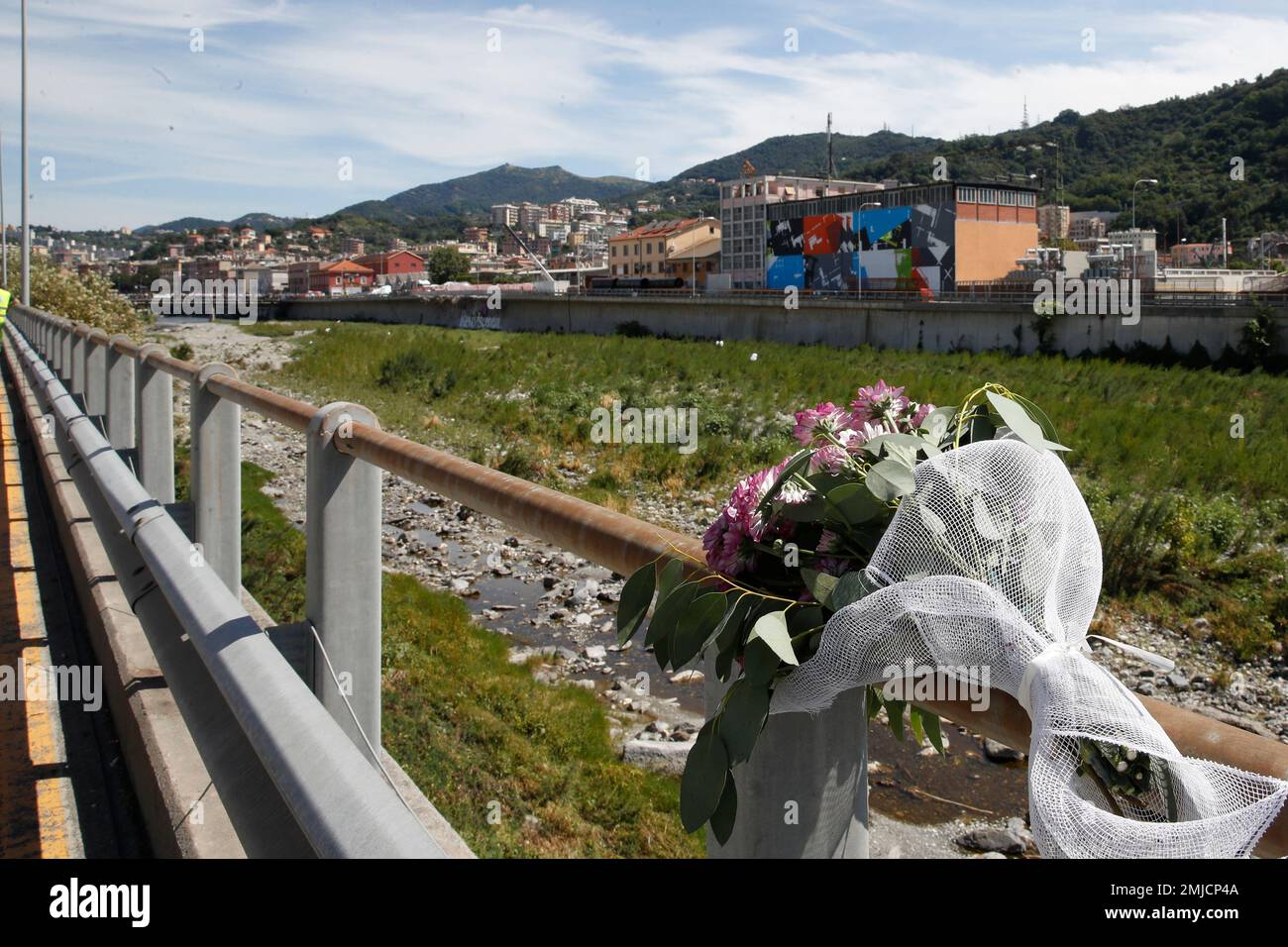 Flowers were left along the course of the Polcevera bridge during a ...
