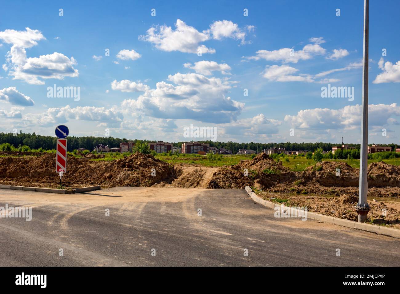 End of the road. End of asphalt, building a new district Stock Photo ...