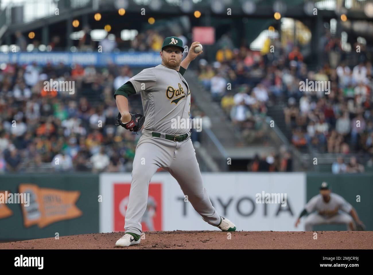 Oakland Athletics pitcher Brett Anderson throws to a San Francisco ...