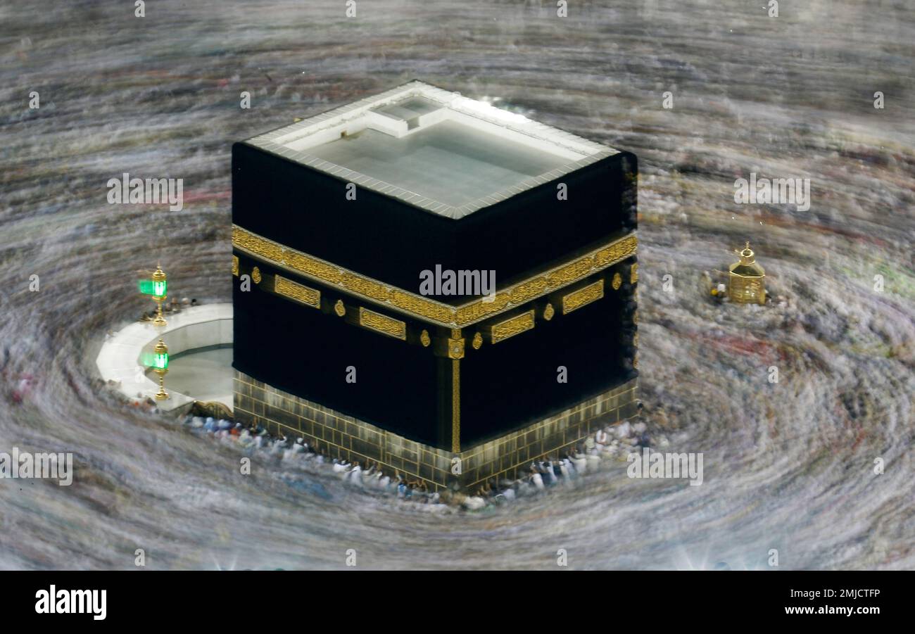 In this picture taken with slow shutter speed, Muslim pilgrims ...