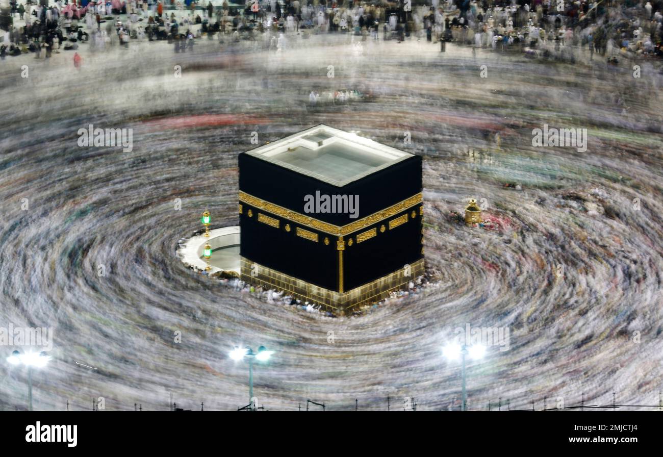 In this picture taken with a slow shutter speed, Muslim pilgrims ...