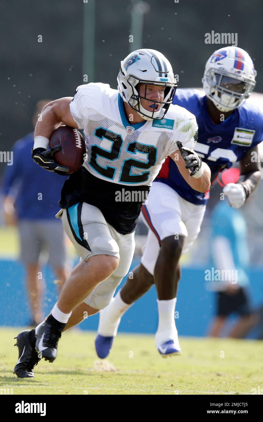 Carolina Panthers' Christian McCaffrey (22) runs the ball during an NFL ...
