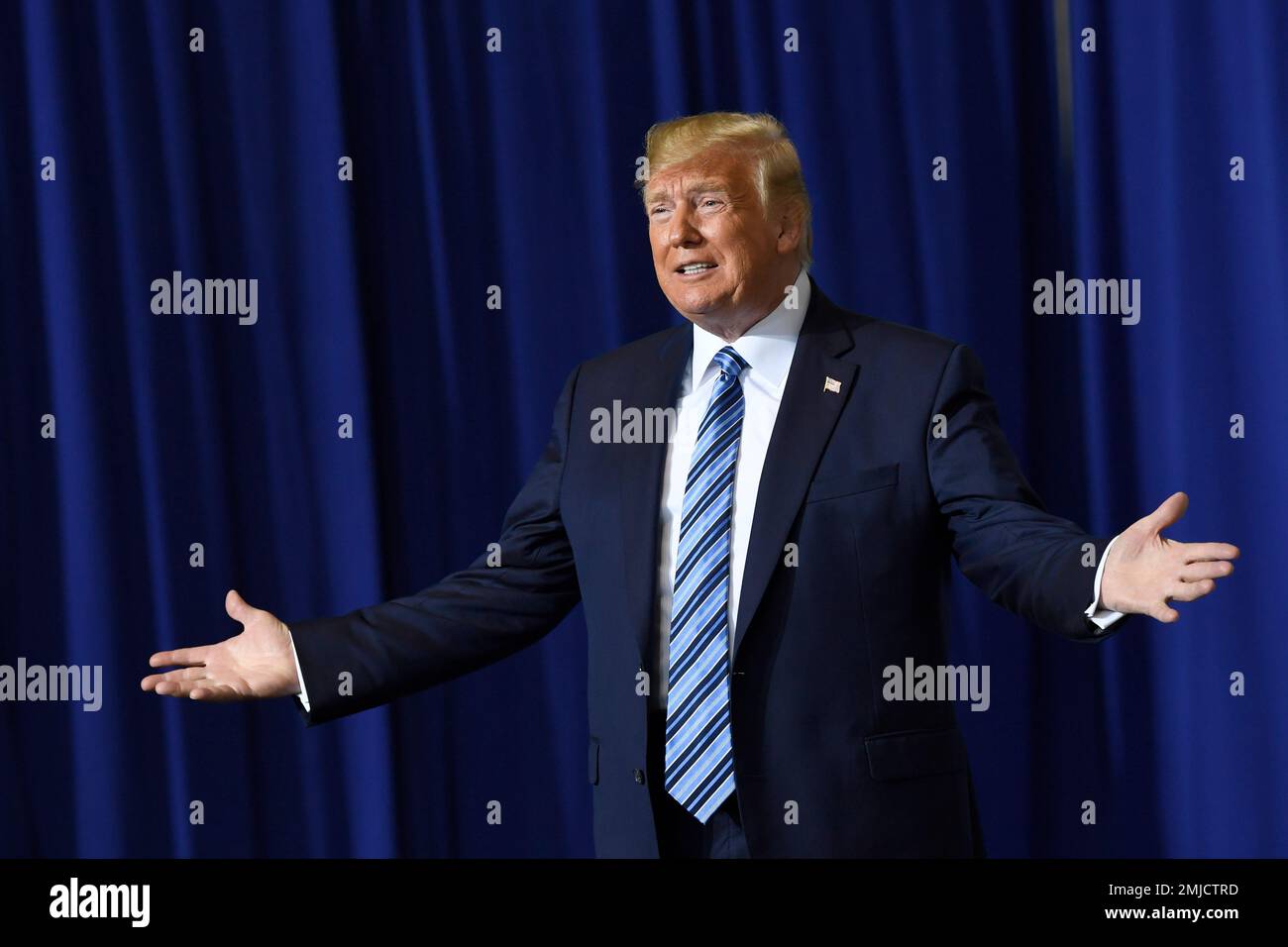 President Donald Trump arrives to speak during a visit to the ...