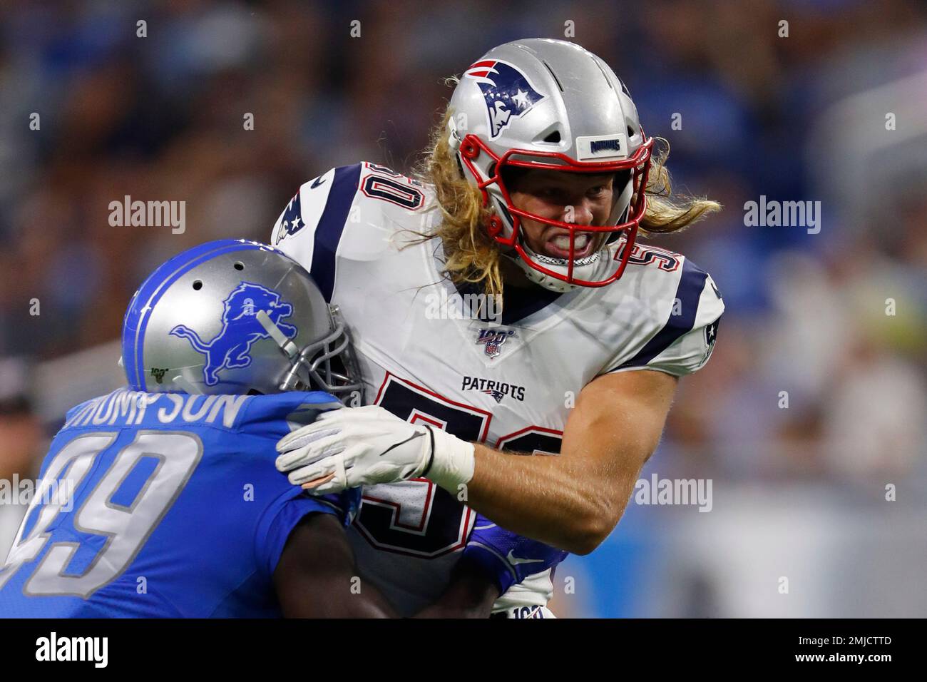 New England Patriots' Chase Winovich sheds the block of Detroit Lions ...