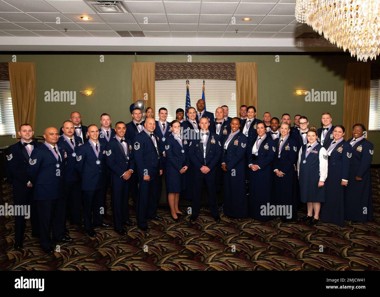 More than 30 Airmen promoted to master sergeant pose for a group photo ...