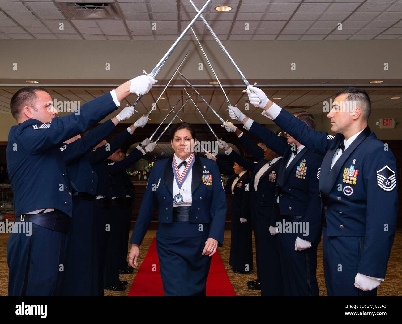 Master Sgt. Danica Bowes, 88th Medical Group, passes through the sword ...