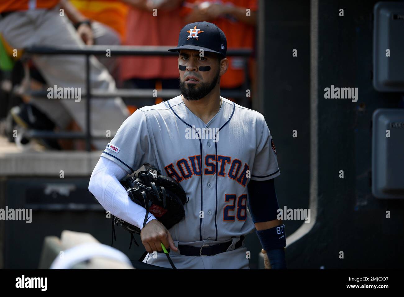Houston Astros' Robinson Chirinos walks in the dugout before a baseball ...