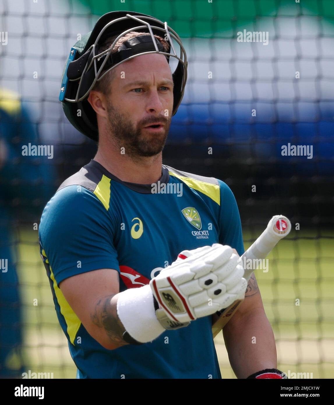 Australia's Matthew Wade pads up for a training session at Lord's ...