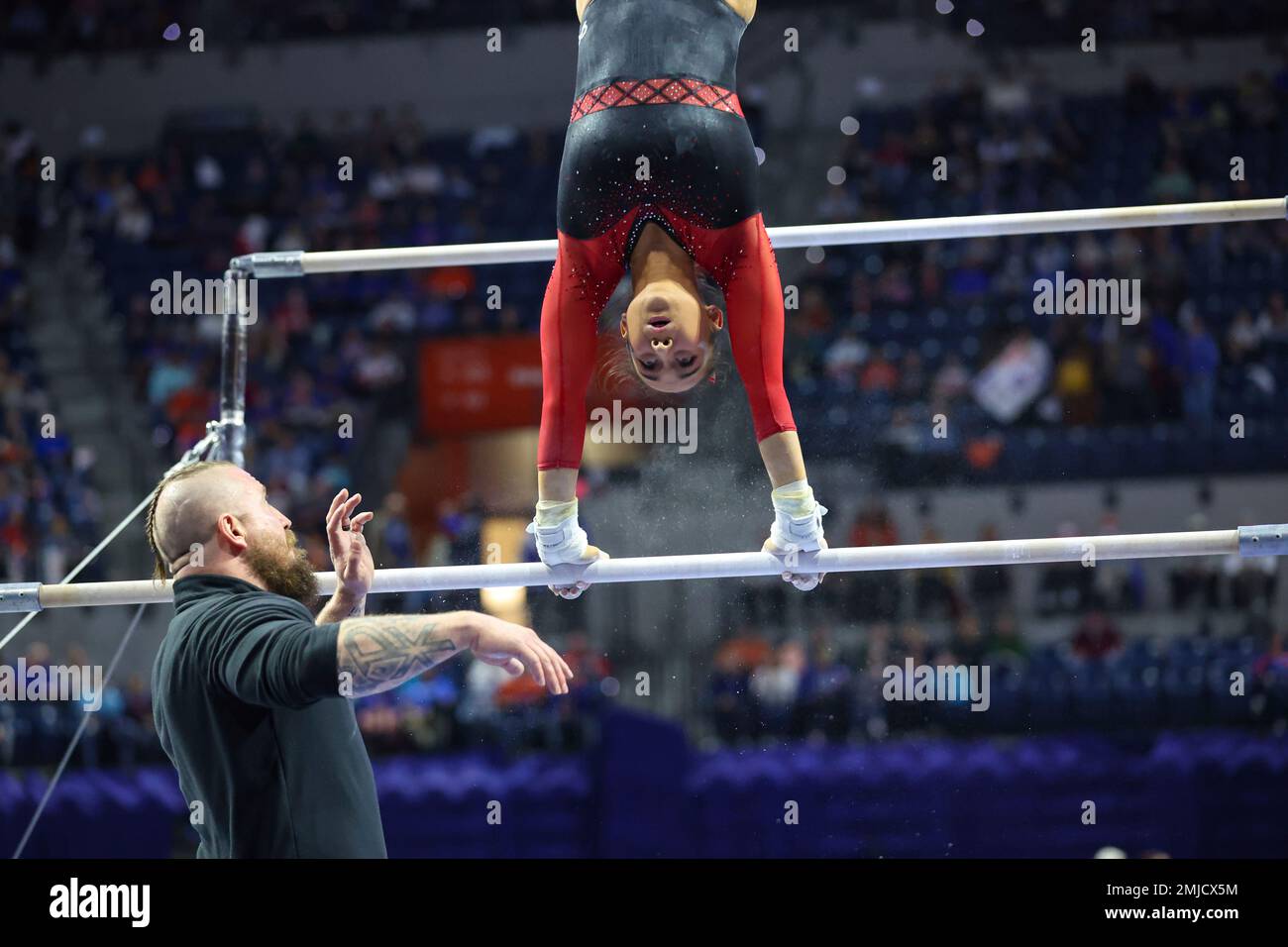 Georgia's Amanda Cashman competes on the uneven bars during an NCAA ...